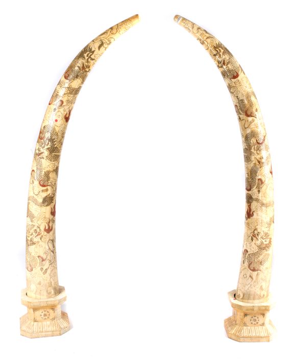 Bonhams : A pair of large Chinese carved bone veneer tusks on dragon ...