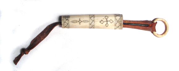 Bonhams : An Eskimo bone needle case