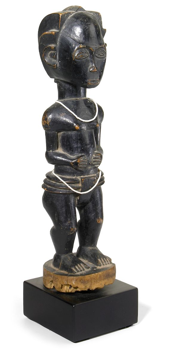 Bonhams : A Baule female figure, Ivory Coast height 12in