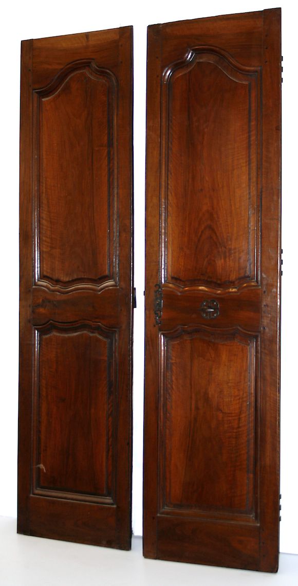 Bonhams : A pair of Louis XV carved walnut doors 18th century