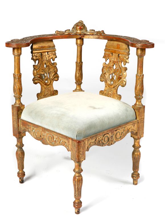 Bonhams : An pair of Italian Baroque gilt decorated corner chairs