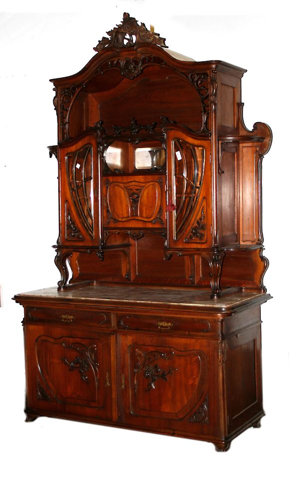 Bonhams : A Rococo style carved walnut marble top buffet