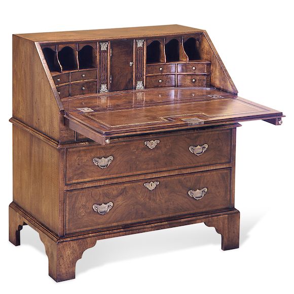Bonhams : A George I style walnut slant front desk