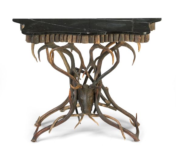 Bonhams : A Continental horn and marble console table, in the Black Forest taste