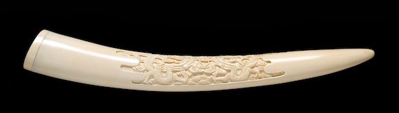 Bonhams : An ivory tusk with carved dragon panel 20th Century