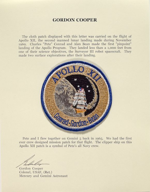 Bonhams : FLOWN APOLLO 12 "ALL NAVY" CREW EMBLEM.