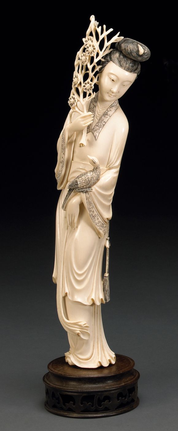 Bonhams : A tinted ivory standing beauty 20th Century
