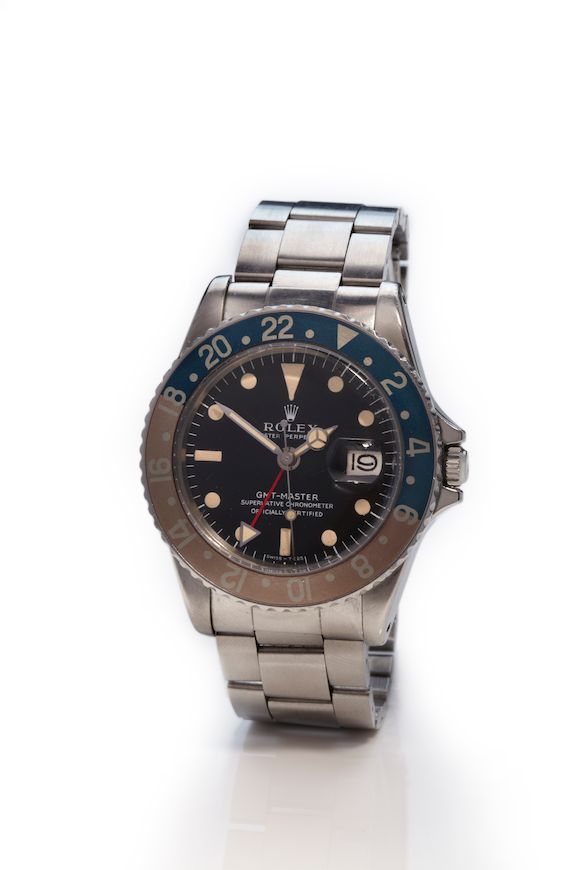 Bonhams : Rolex. A stainless steel automatic dual time zone calendar ...