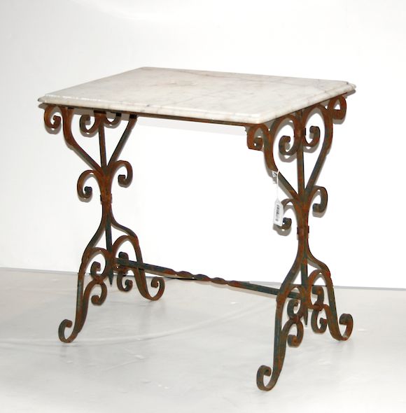 Bonhams : A pair wrought iron pastry tables with marble tops