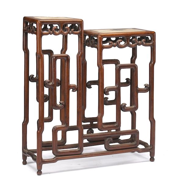 Bonhams : A marble top two-tiered display table