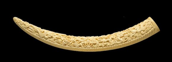 Bonhams : A carved ivory tusk with dragon decoration 20th Century
