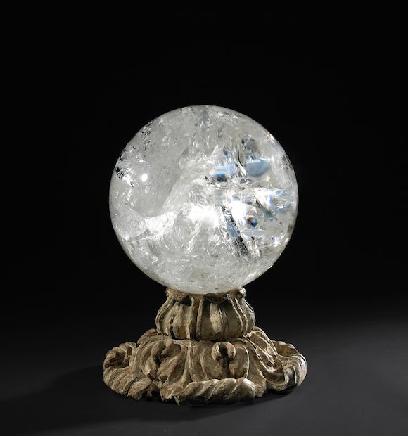 Bonhams : A rock crystal orb on 18th century giltwood base