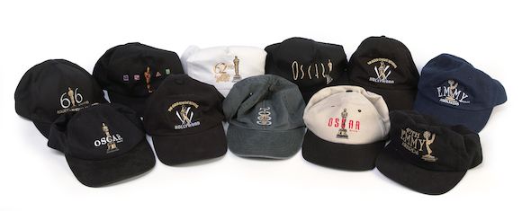 Bonhams : A group of Oscar and Emmy baseball caps, 1980s-1990s