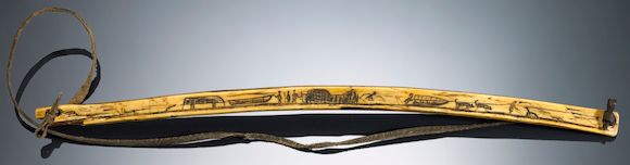 Bonhams : An Eskimo scrimshaw ivory bow drill