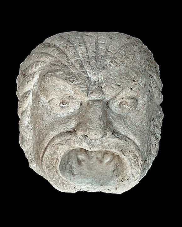 Bonhams : A Roman round white marble fountain mask