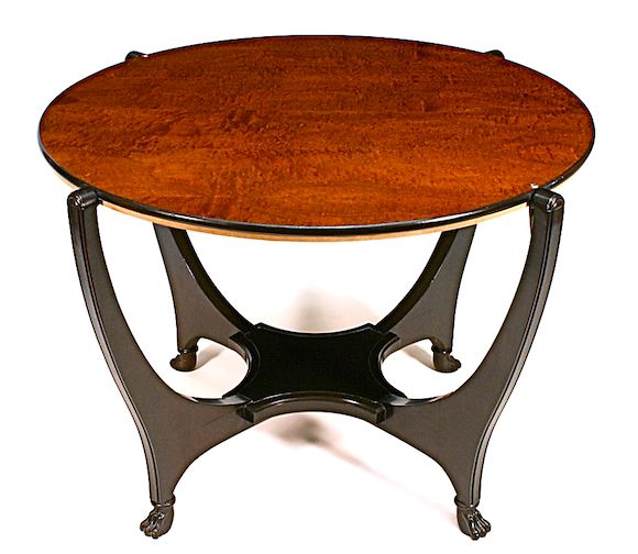 Bonhams : A Hunzinger ebonized wood tilt top games table circa 1894