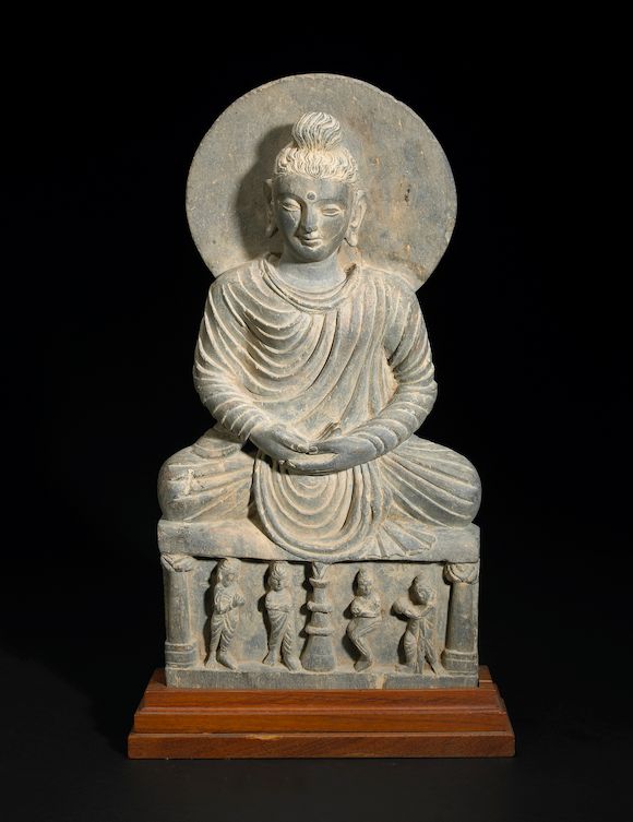 Bonhams : A Gandharan grey schist figure of the Buddha 2nd/4th Century C.E.