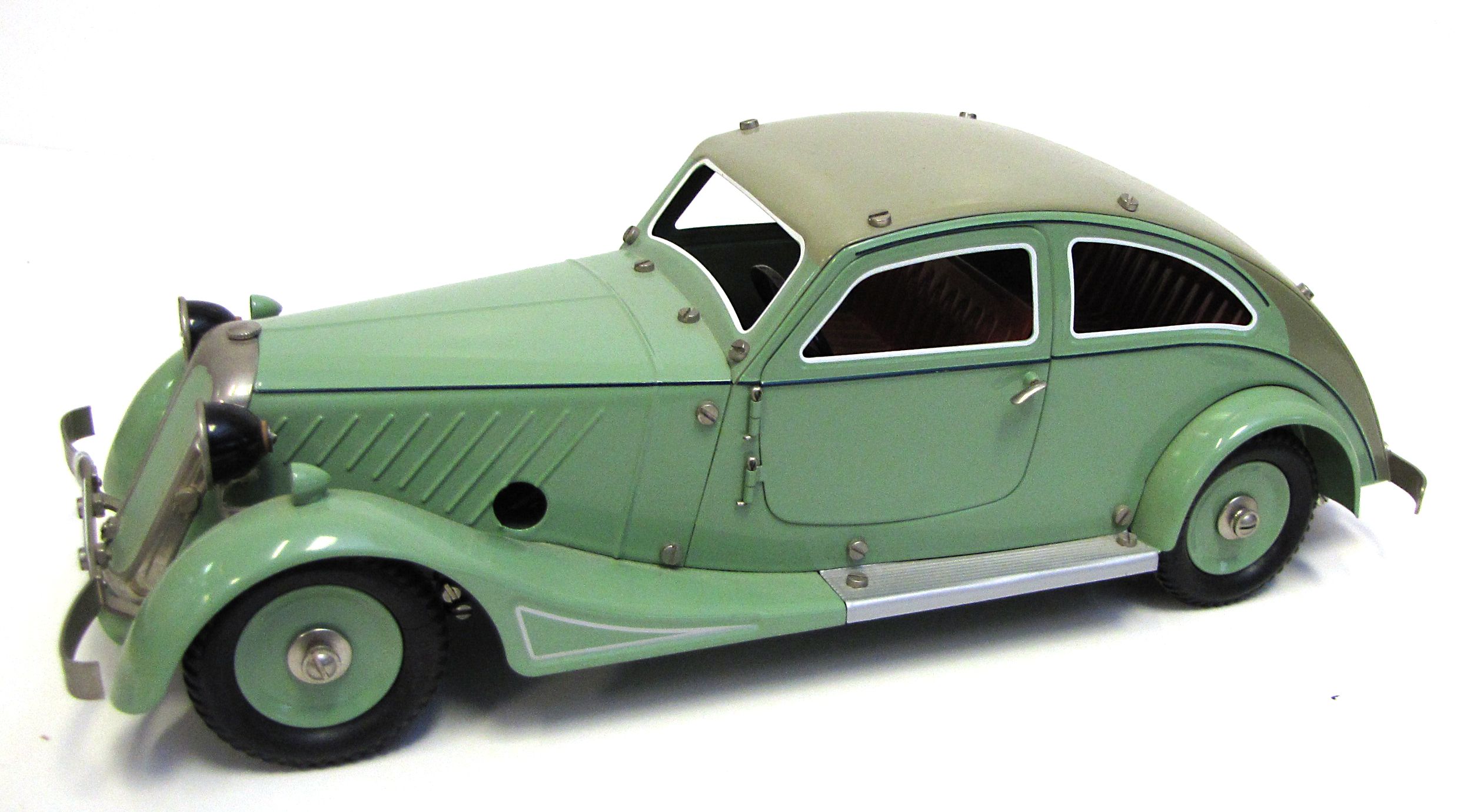 Bonhams Cars : A Streamlined Sedan clockwork car by Marklin, 1997,