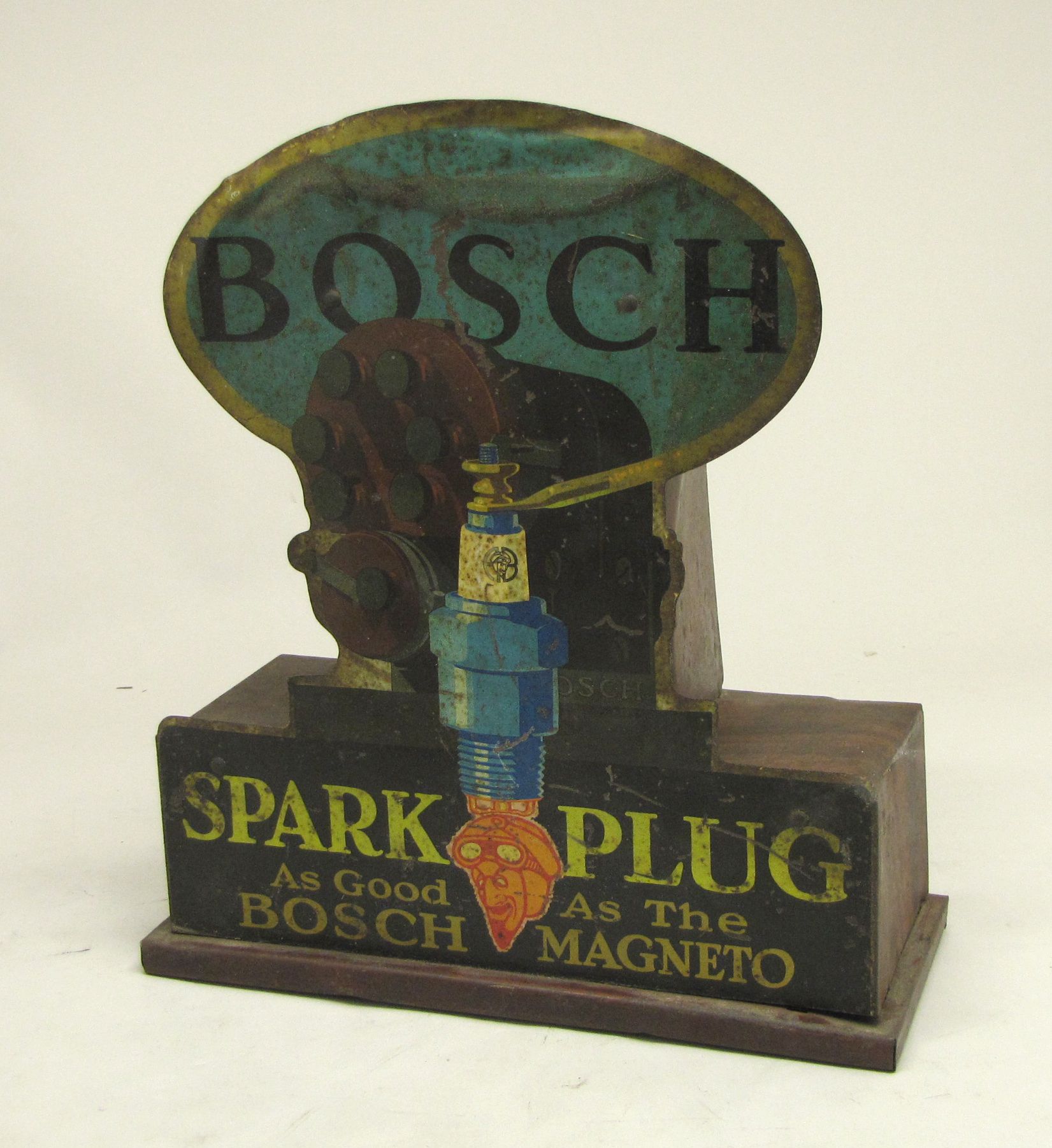 Bonhams Cars : A Bosch Spark Plug counter top display, circa 1915,
