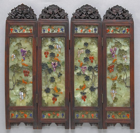 Bonhams : A small four-panel wood and hardstone-mounted table screen ...