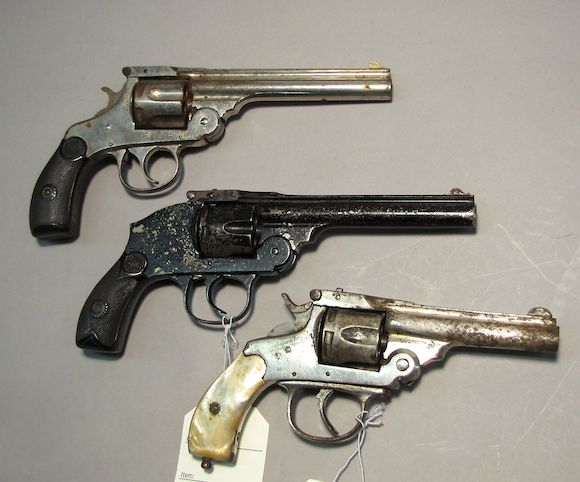 Bonhams : A lot of three late 19th century American top break revolvers