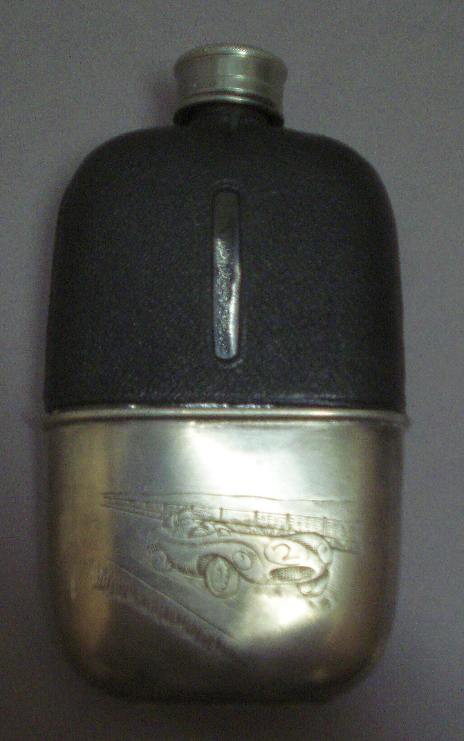 Bonhams Cars : A gentleman's 'Jaguar' pocket flask, British, 1950s,