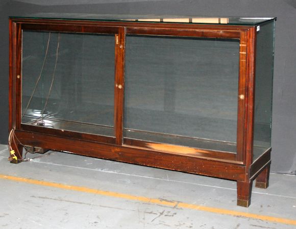 Bonhams : A glass and wood horizontal display cabinet