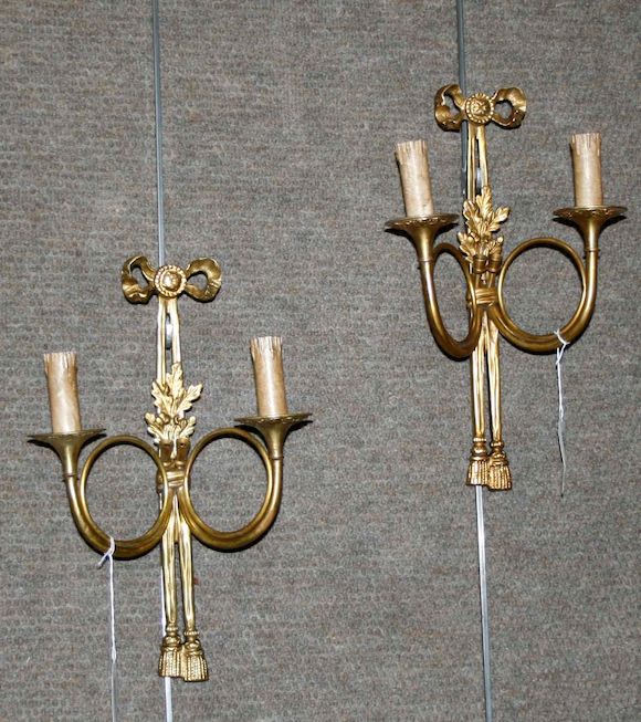 Bonhams : A set of four Louis XVI style gilt bronze two light bras de ...