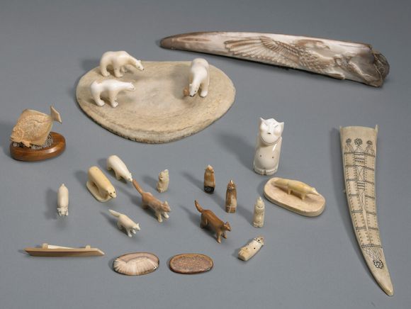 Bonhams : A grouping of Eskimo marine ivory figures and curios