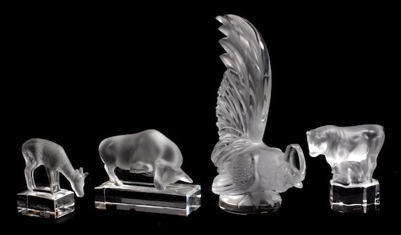 Bonhams : A group of three Lalique glass animal paperweights and a ...