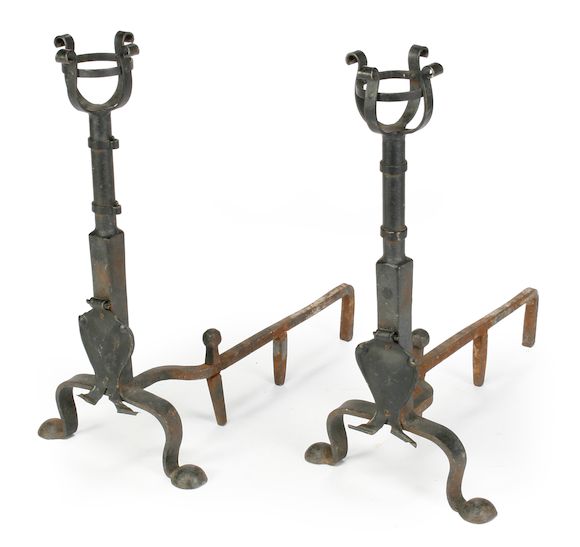 Bonhams : A pair of Spanish Baroque style cast iron andirons