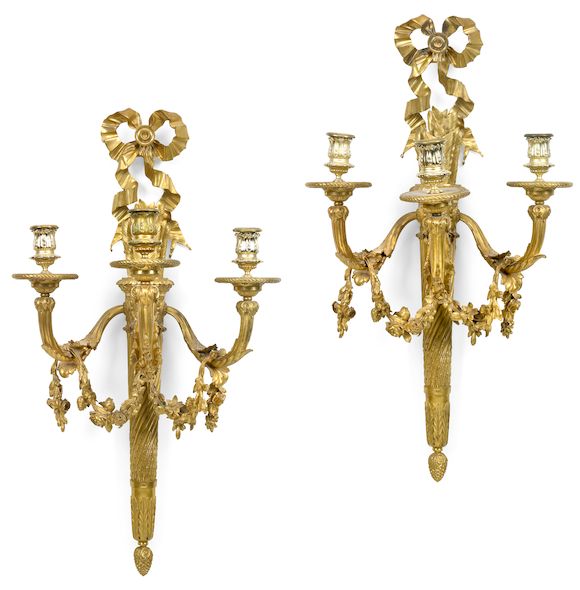 Bonhams : A pair of Louis XVI style gilt bronze three light bras de ...
