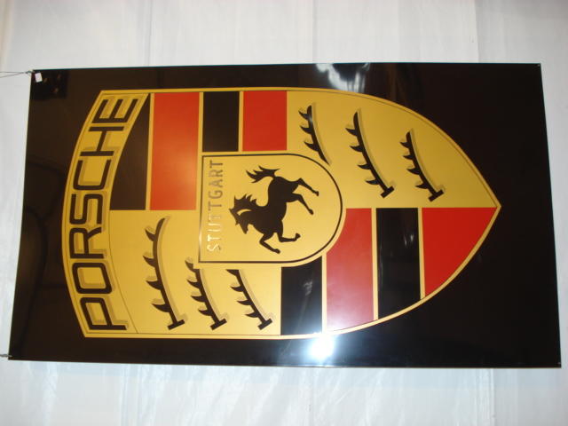 Bonhams Cars : A large Porsche emblem sign,