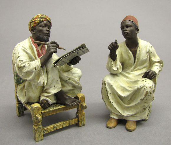 Bonhams : A pair of Austrian cold painted bronze figures of a North ...