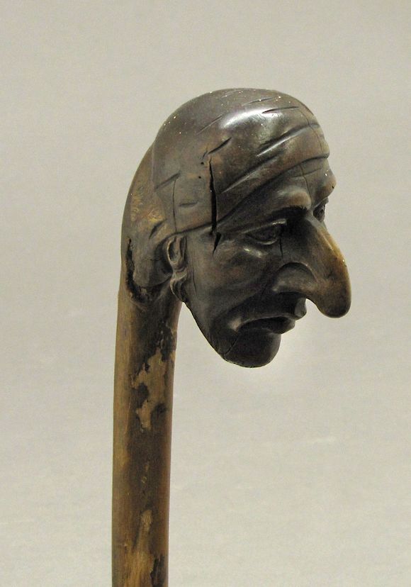 Bonhams : Three carved wood novelty canes late 19th/early 20th century