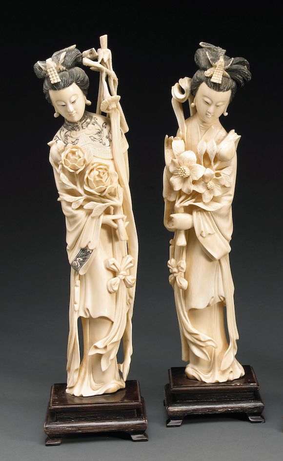 Bonhams : Two carved and tinted ivory figures of beauties 20th Century