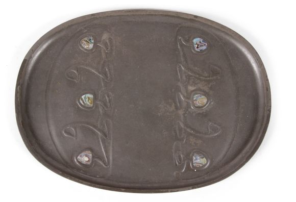 Bonhams : An Arts & Crafts mother of pearl inlaid pewter plaque