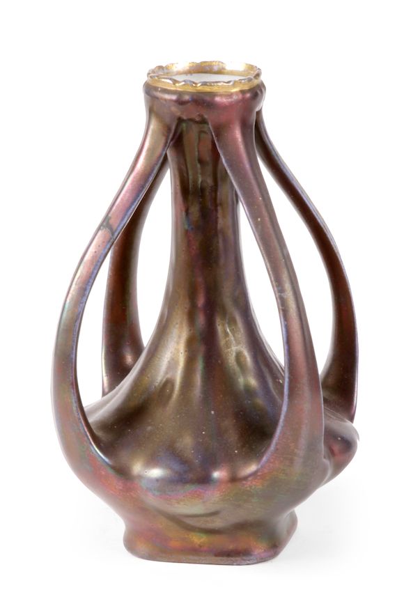 Bonhams : A French luster glazed earthenware four handled vessel
