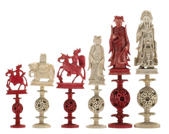 Bonhams : A Chinese Export pierce-carved ivory puzzle ball chess set ...