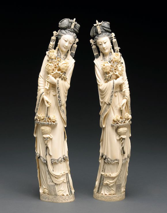 Bonhams : A pair of tinted ivory beauties 20th Century