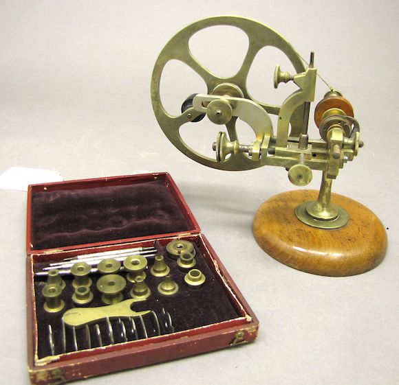 Bonhams : A French watchmaker's brass lathe and box of accessories ...