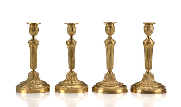 Bonhams : Two similar pairs of Louis XVI style gilt bronze candlesticks ...