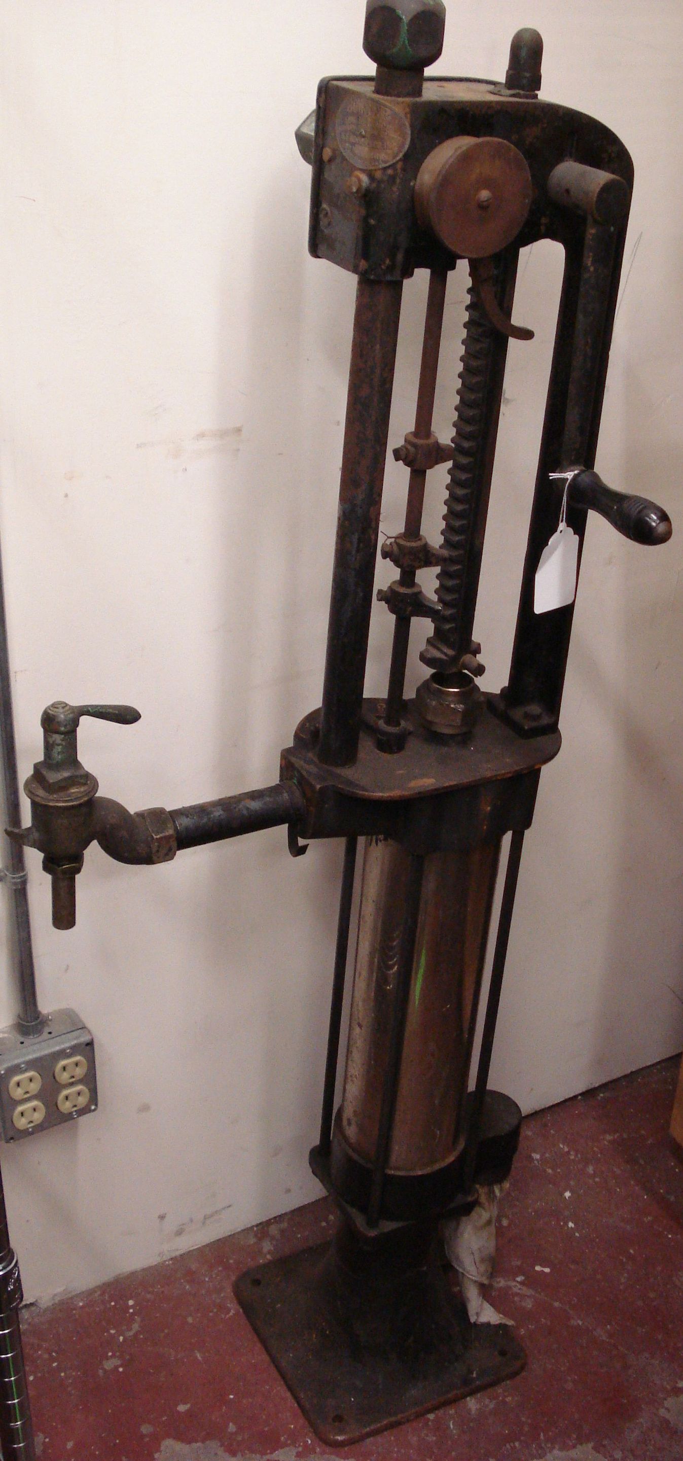 Bonhams Cars : An early Bowser 'Skeleton' gasoline pump, circa 1920,