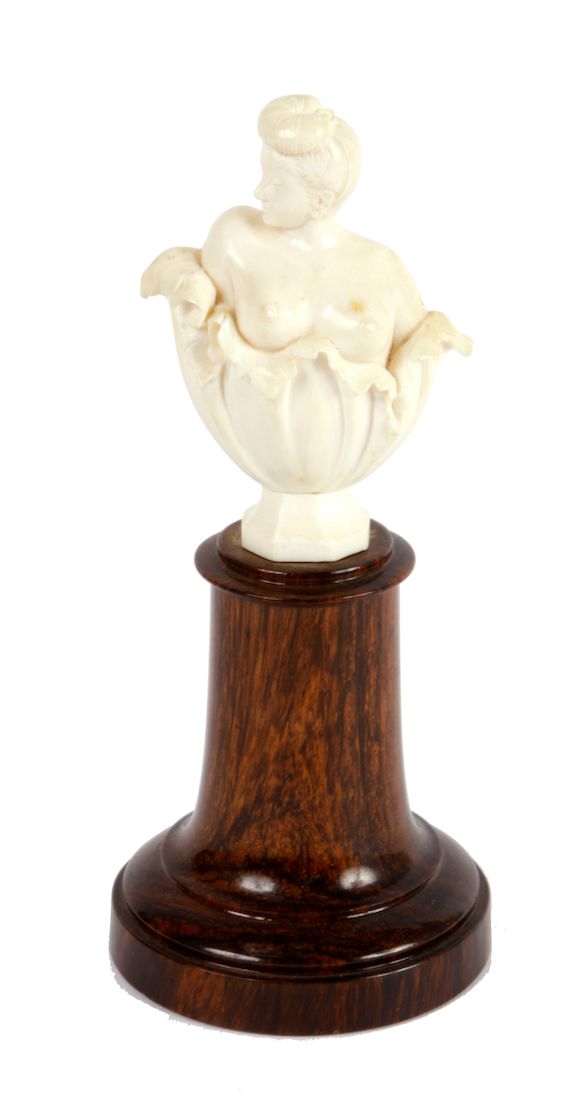 Bonhams : A carved ivory bust of a young woman
