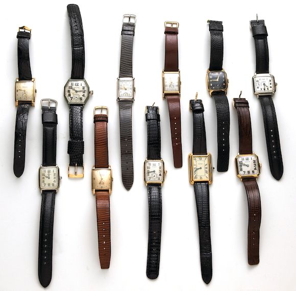 Bonhams : A collection of eleven gold-filled and metal watch heads