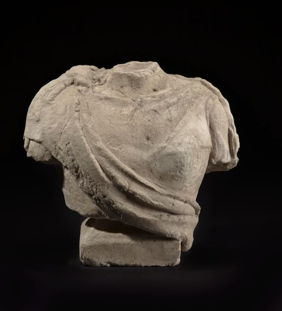 Bonhams : A Roman style stone sculpture of a draped torso