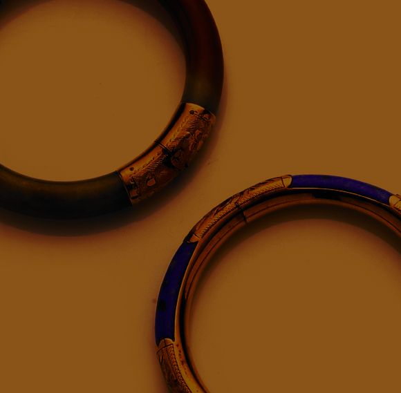 Bonhams : A collection of two hard stone and gold bangle bracelets