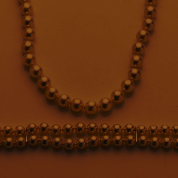 Bonhams : A strand of cultured pearls together with a two row cultured ...