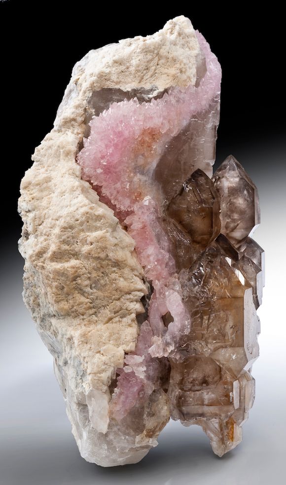 Bonhams : Exceptional Pink Rose Quartz with Smoky Quartz on Feldspar