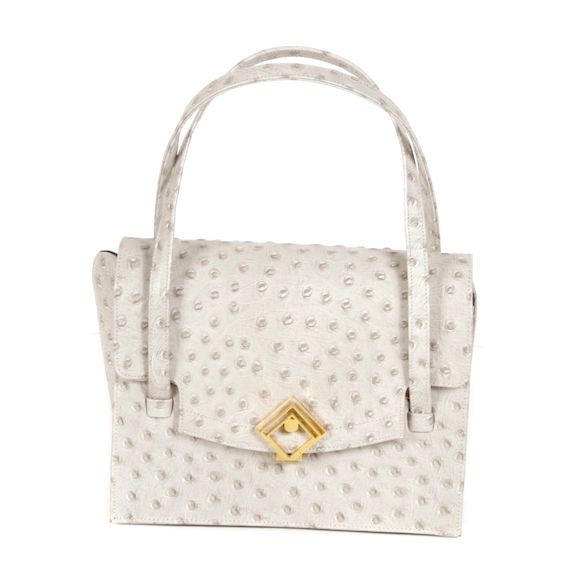 Bonhams : A white embossed leather purse